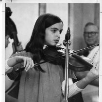 J'anna Jacoby (at age 12). Caption: "J'anna Jacoby fiddlin' up a storm ...