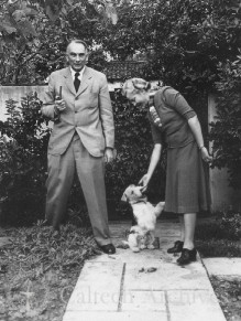 Richard and Ruth Tolman with their dog — Calisphere