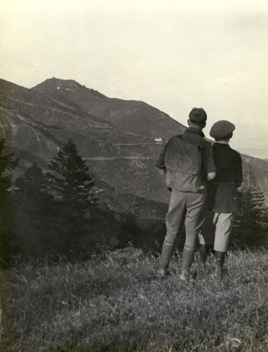 Hikers contemplating view from trail above Rock Springs, Mt. Tamalpais ...