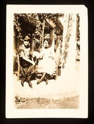 Dorothy Raegen Talbot and Elizabeth Burbank sitting on porch of Burbank ...