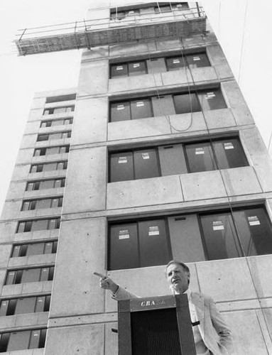 A ceremony at Cathay Manor. Ed Edelman is standing behind the podium ...