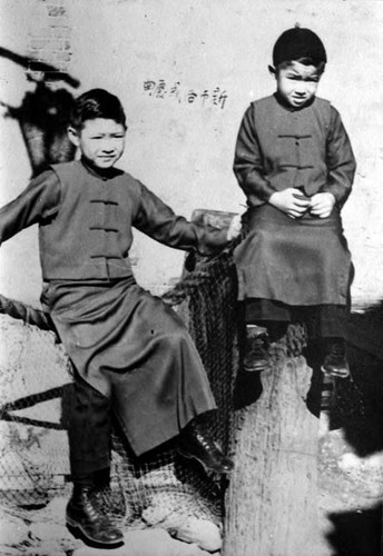 Gilbert and Ronald Siu at the harbor — Calisphere