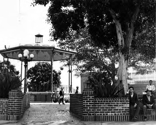 Kiosko from Main Street through brick wall — Calisphere