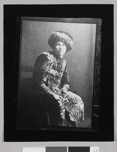 Portrait of Charmian London in a leopard skin dress and hat — Calisphere