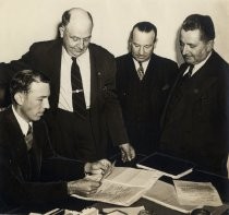 William E. Riker with federal officers — Calisphere
