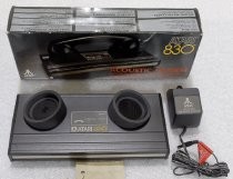 Atari 830 acoustic modem and power adapter — Calisphere