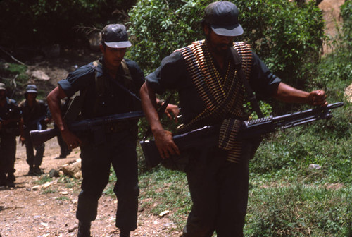 A Contra soldier with light machine gun, Nicaragua, 1983 — Calisphere