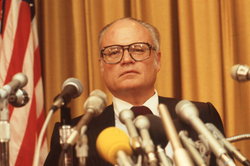 Ambassador Deane R. Hinton speaking at a press conference, San Salvador ...