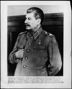 Josef Stalin in uniform with hand inside jacket front, 1948 — Calisphere
