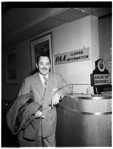 Julian Hartt leaves for Korea, 1952 — Calisphere