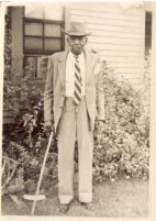 Alfred Kerruthers Quinn in yard — Calisphere