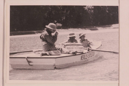 Del Reed at the oars of the "Joan." Deason rides aft and Doris Nevills ...