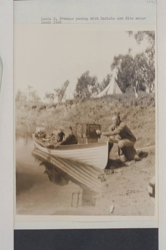 Lewis R. Freeman posing with Radiola and Elto motor — Calisphere