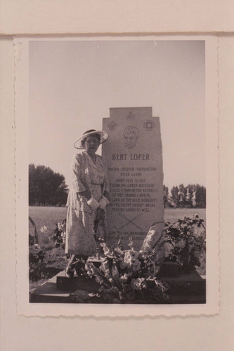 Rachel Loper standing by the monument to Bert Loper at Greenriver, Utah ...
