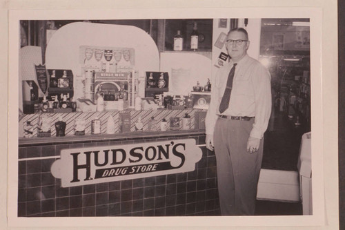 Ed Hudson in front of his drug store in Paso Robles, California ...