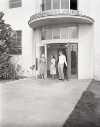 George Pepperdine College entrance with two students and a professor 2 ...