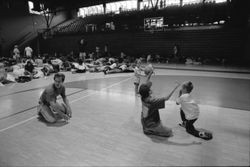 Evacuees in Firestone Fieldhouse — Calisphere