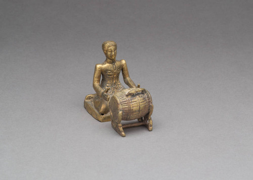 Figurine Playing Skor Arak (Spirit Drum), #3 — Calisphere