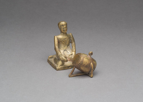 Figurine Playing Skor Arak (Spirit Drum), #2 — Calisphere