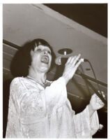 Ruth Price singing on stage, Los Angeles [descriptive] — Calisphere