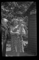 Paul West Deaver and Mrs. Blanche Sanders pose in the yard of her home ...
