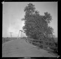 White Bridge with trees planted next to it, Red Oak, 1900 — Calisphere