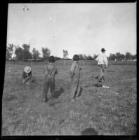 William Mead walks across a field after shooting clay blackbirds, as ...
