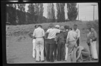 Group of Boy Scouts huddle together at Camp Arthur Letts, Los Angeles ...