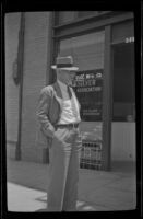 Ralph B. Clapp stands outside his office, Los Angeles, 1939 — Calisphere