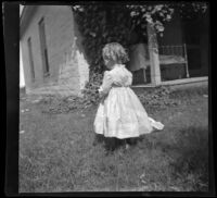 Lucille McIntyre stands in the front yard of the McIntyre family home ...