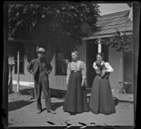 Charlie Mertz, Kate Mertz and and Frances Nichols standing outside ...