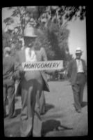 Ralph Hiatt holds a sign at the Iowa Picnic in Bixby Park, Long Beach ...