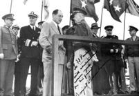 Edwin Pauley, Dwight D. Eisenhower and military officials on platform ...