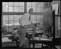 Paul Sample working on a painting in his studio, Pasadena, circa 1935 ...