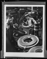 Workers in the factory of the Goodyear Tire and Rubber Company, Los ...