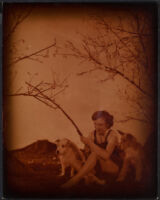 Sheila Mannors, actress, in cut-off overalls, holding a fishing pole ...