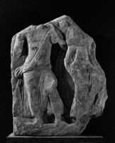 Bas-relief fragment depicting heavily deteriorated human figures ...