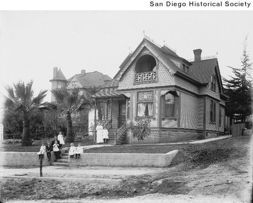 The Reinbold family outside their home at 1440 Ninth Avenue — Calisphere