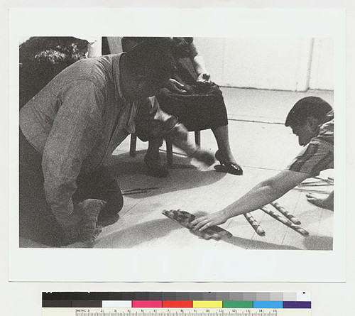 Dave Peri playing stick game and Essie Parrish and Sidney Parrish ...