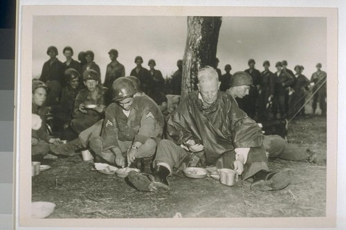 Governor Earl Warren (right) of California eating lunch with CPL Marian ...