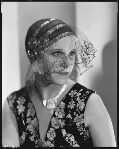 Peggy Hamilton modeling a Hortense dinner hat, 1931 — Calisphere