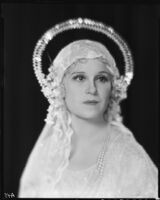 Peggy Hamilton modeling an Earl Luck wedding veil, 1931 — Calisphere