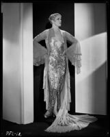 Peggy Hamilton modeling a Travis Banton hostess gown with beaded ...