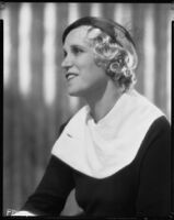 Peggy Hamilton modeling a dress with a wide white collar, 1933 — Calisphere