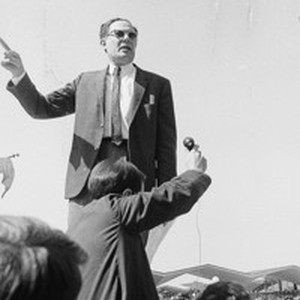 Mario Savio speaking from top of police car — Calisphere