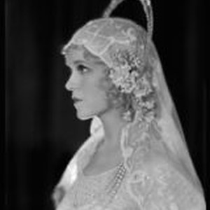 Peggy Hamilton modeling an Earl Luck wedding veil, 1931 — Calisphere