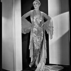Peggy Hamilton modeling a Travis Banton hostess gown with beaded ...