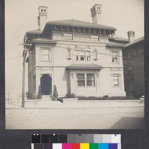 Third floor playroom [with Elise Stern Haas holding a doll] — Calisphere