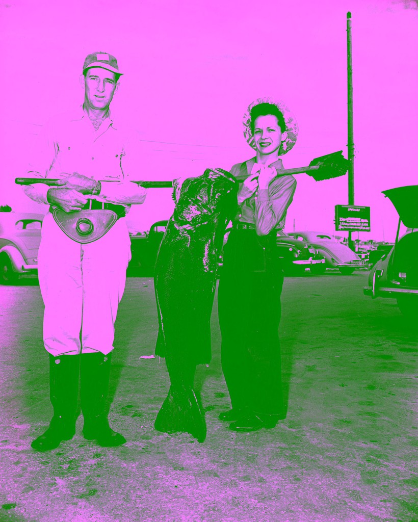 Mr. and Mrs. C.B. Reeder with a black sea bass, Newport Beach ...