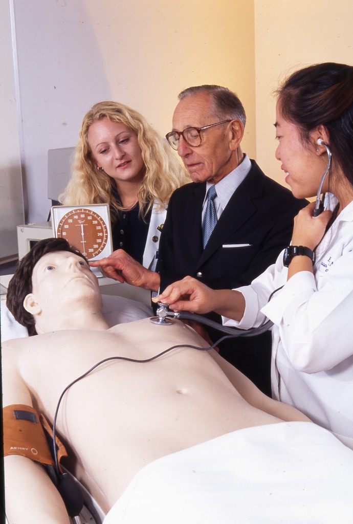 Dr. Berk with medical students. — Calisphere